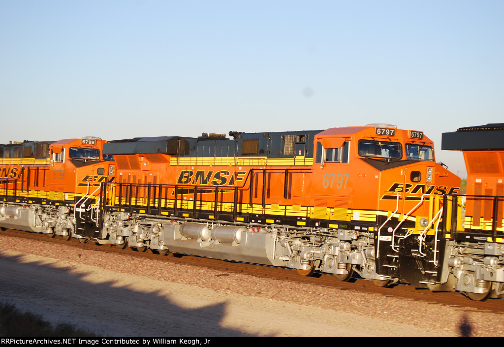 BNSF 6797 and 99 Gleam in the Early Morning Sunlight.